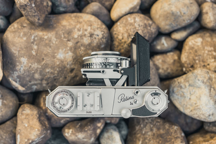 Free: Gray Camera on Stones - nohat.cc