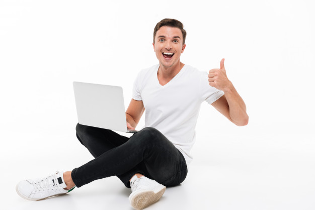 Free: Portrait of a happy excited man holding laptop computer Free ...