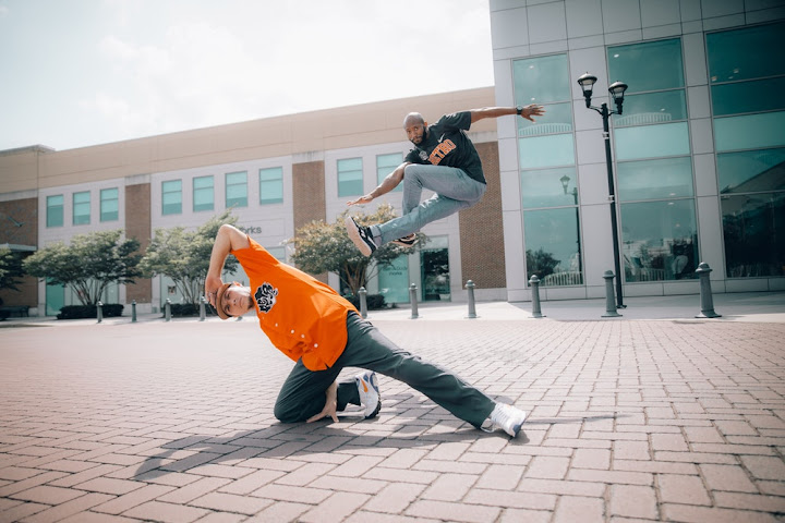 Free: Two Men Dancing on Concrete Pavement - nohat.cc