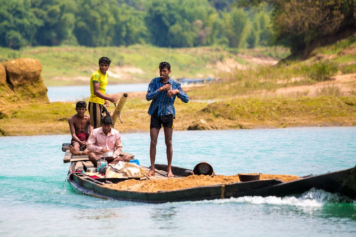 Free: Photo of Men on Motorboat - nohat.cc