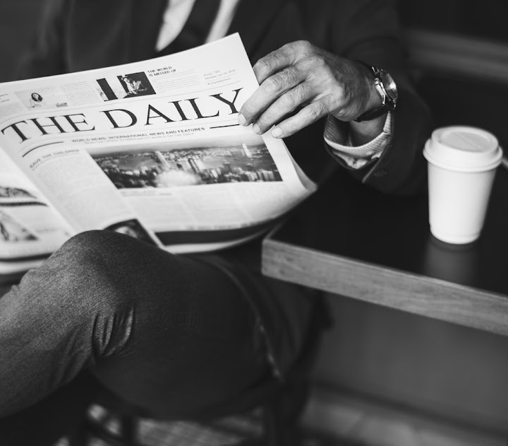 Free: Grayscale Photography of Man Reading Newspaper - nohat.cc