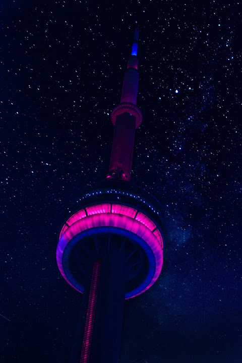 Free: Low-angle Photo of Lighted Tower during Night - nohat.cc
