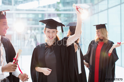 Free: Portrait happy college students in caps and gowns graduating ...