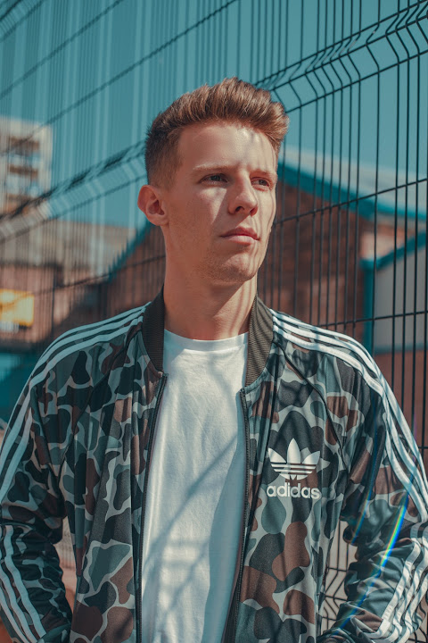 Free: Photo Of Man Wearing Adidas Jacket - nohat.cc